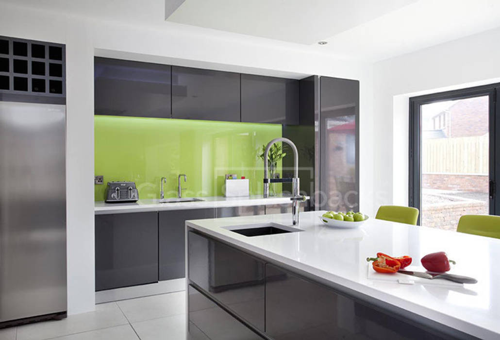 Wild lime glass splashback in grey minimalist kitchen | homify