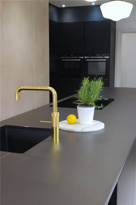 Matte black kitchen with limited edition golden tap by quooker | homify