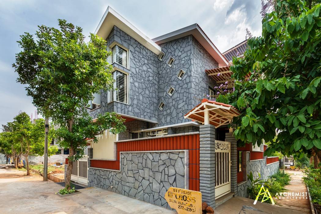 Elevation tropical style houses by archemist architects tropical stone ...