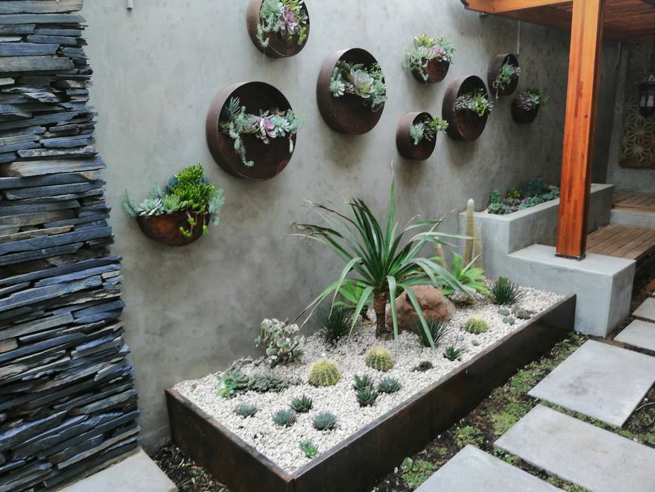 Rusted steel planters, slate wall cladding, wooden pergola, rusted ...