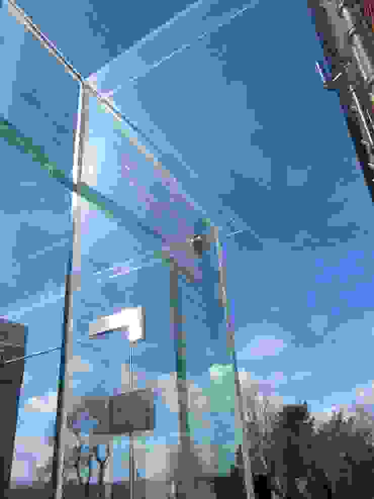 Glass linkway between period Church House & new extension | homify