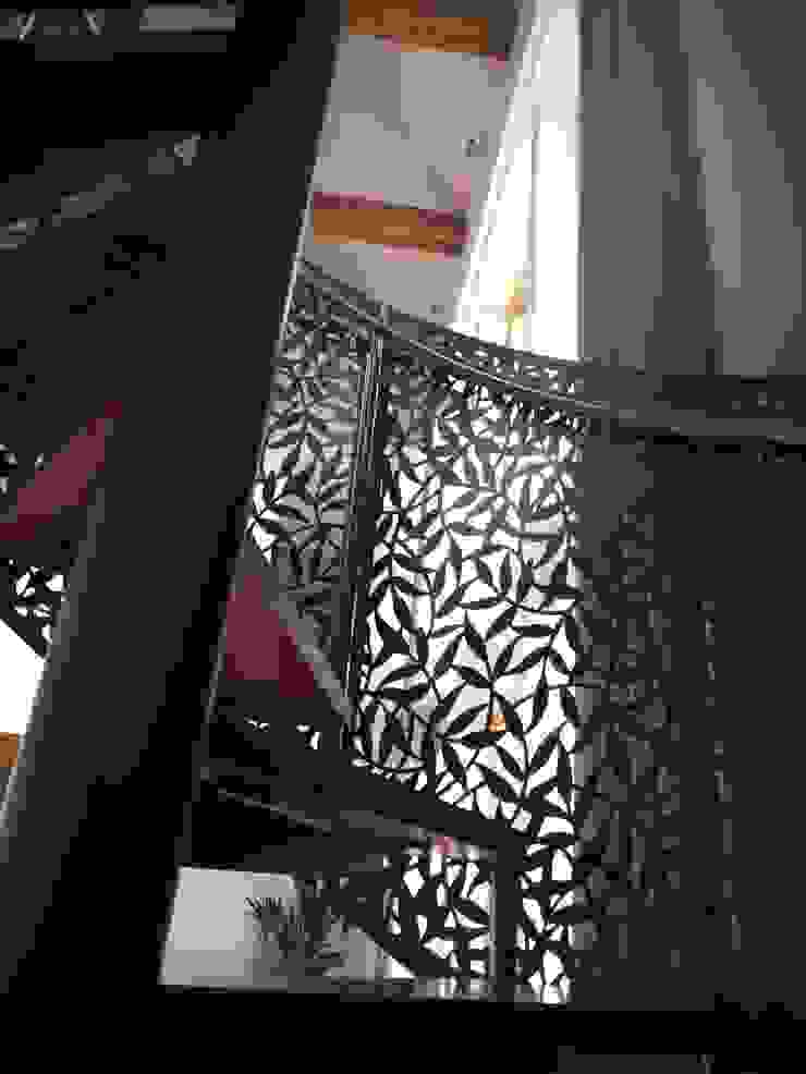 Laser cut screens - Spiral staircase and mezzanine apron. | homify