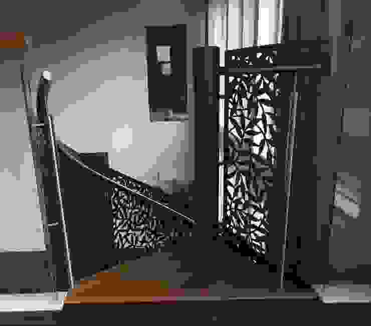 Laser cut screens - Spiral staircase and mezzanine apron. | homify