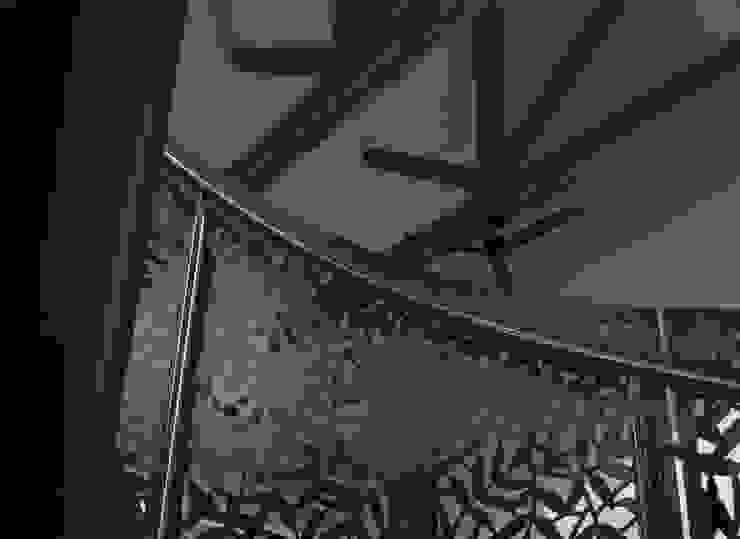 Laser cut screens - Spiral staircase and mezzanine apron. | homify