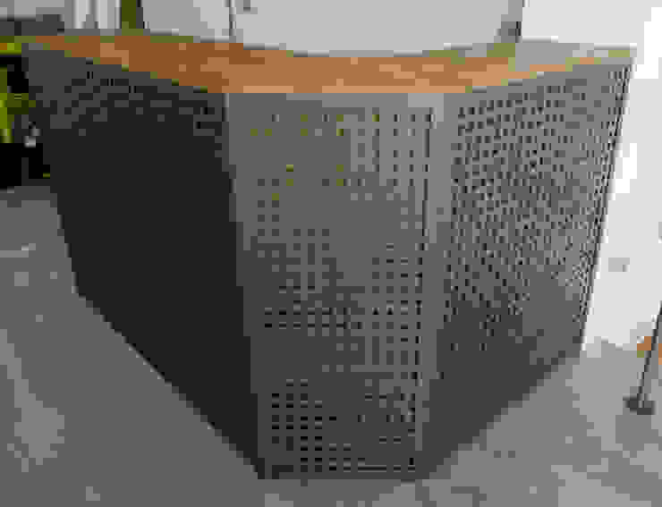 Mostradores en madera y hierro de Vil.la Pingüí | homify