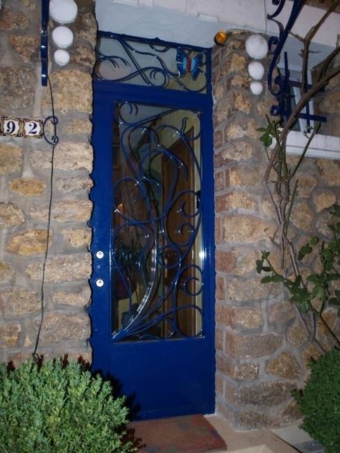 Design contemporain - porte en fer forgé par Fer forgé | homify