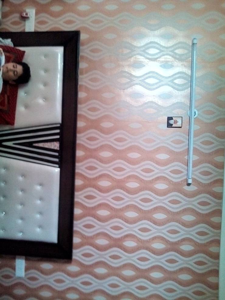 False ceiling design and wallpaper by Mohali Interiors | homify