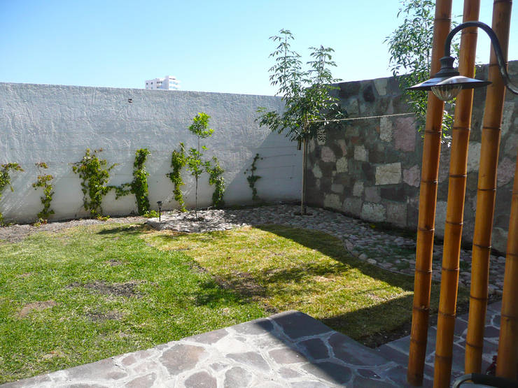 16 ideas de como puedes decorar las paredes de tu patio