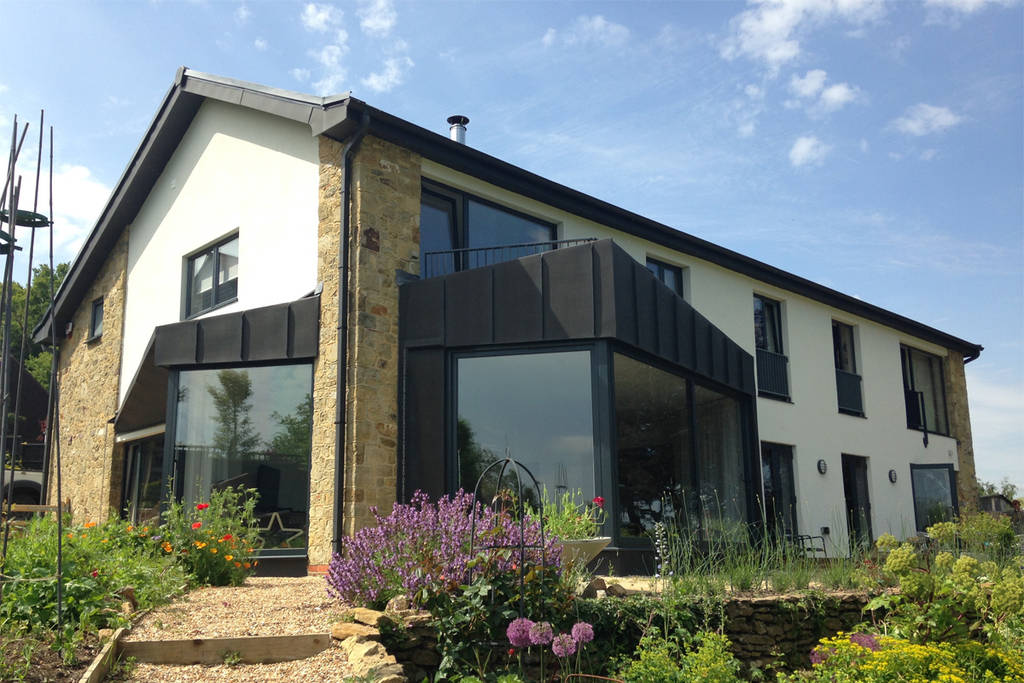 Zinc-clad bay window extensions for 1960s house in west sussex | homify