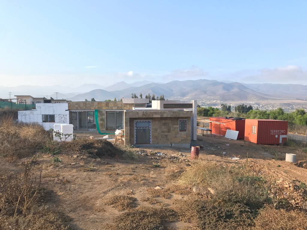 Proceso de construcción fachada posterior vivienda premium 115m2 fundo loreto. | homify