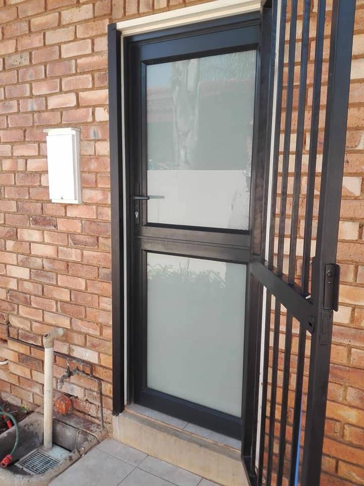 After conversion to charcoal aluminium stable door with white ...