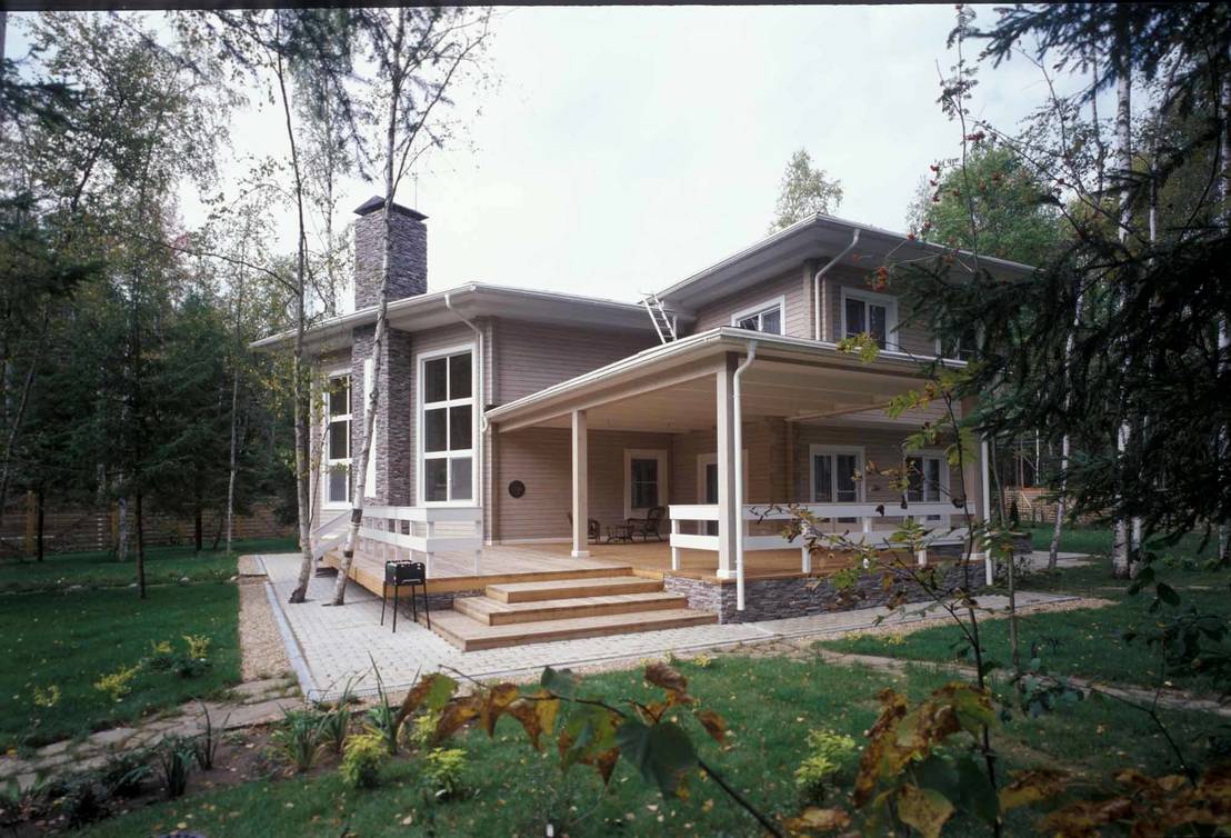 The cozy wooden house in the forest