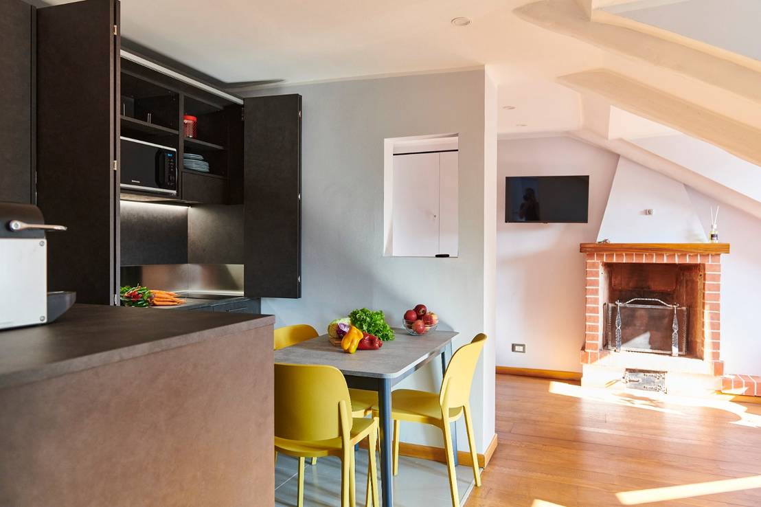 MiniCucine - Mansarda a Torino con mini cucina a scomparsa realizzata ...