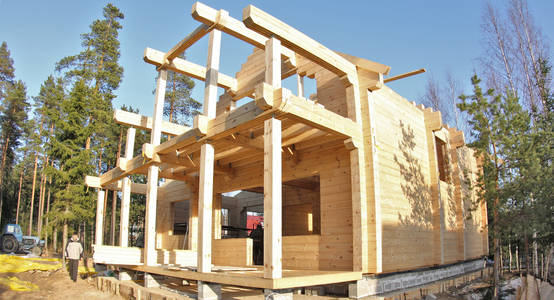 Watch this square log home take shape | homify