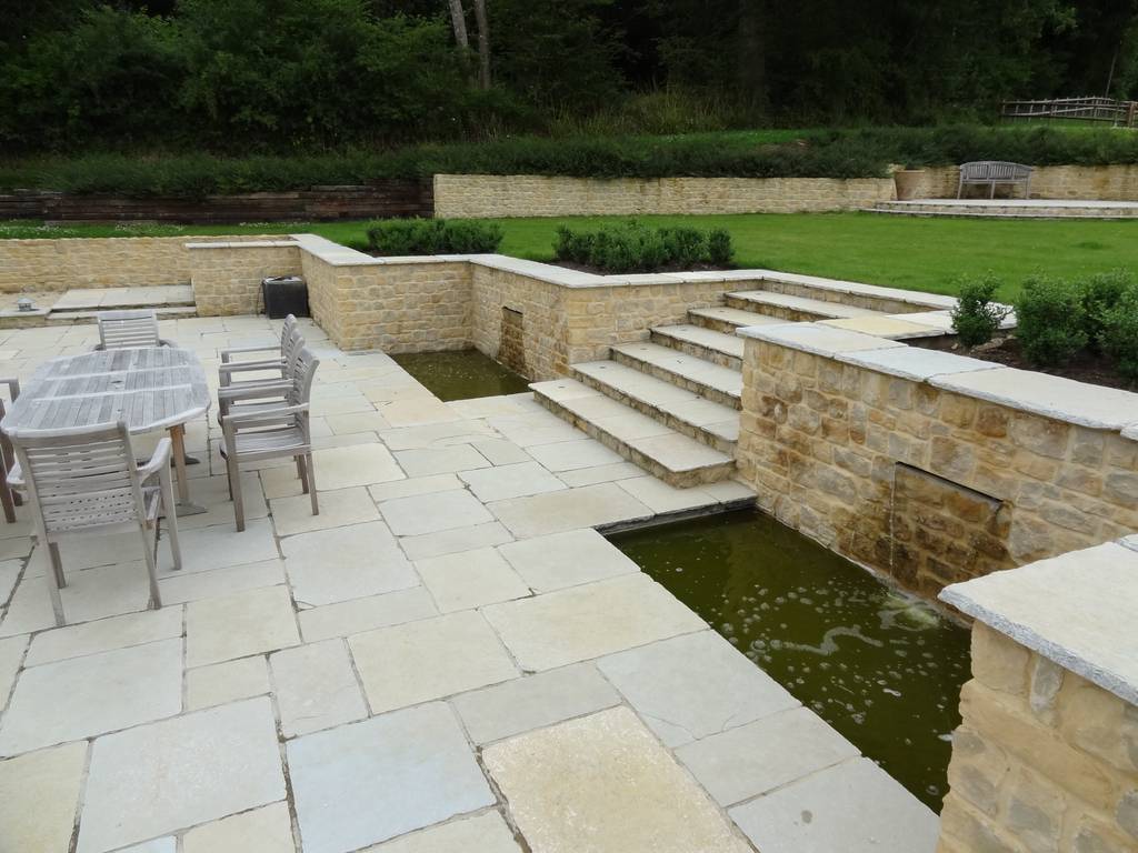 Somerset farmhouse—rear terrace and water features | homify