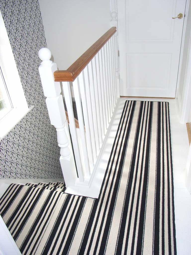 Black and white striped landing carpet | homify