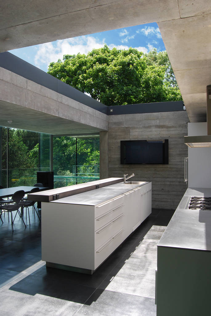 Kitchen with sliding rooflight to create open-air court | homify