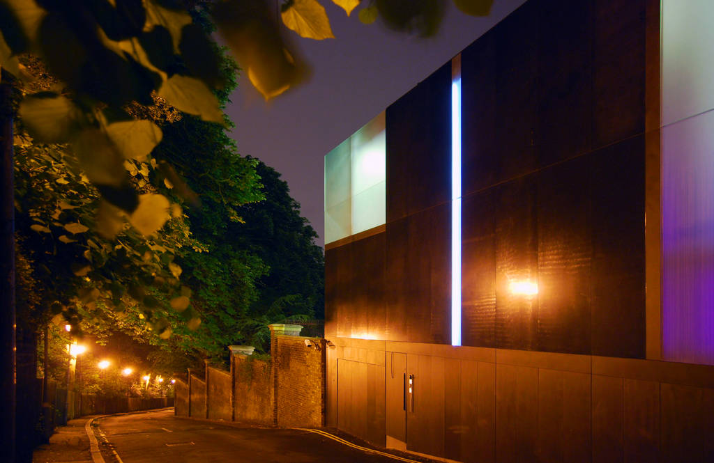 Night view of street facade | homify