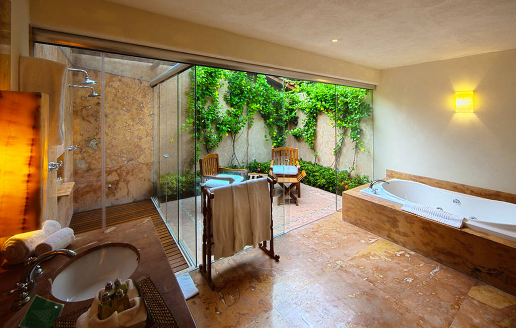 Casa sol josé vigil arquitectos baños tropicales | homify