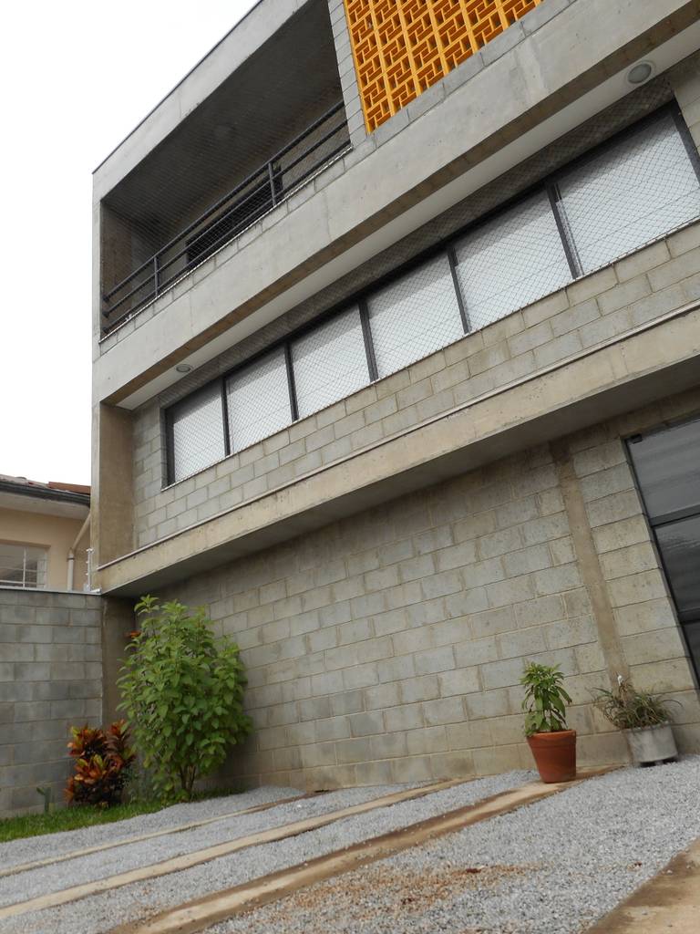 Fachada com bloco e concreto aparente | homify