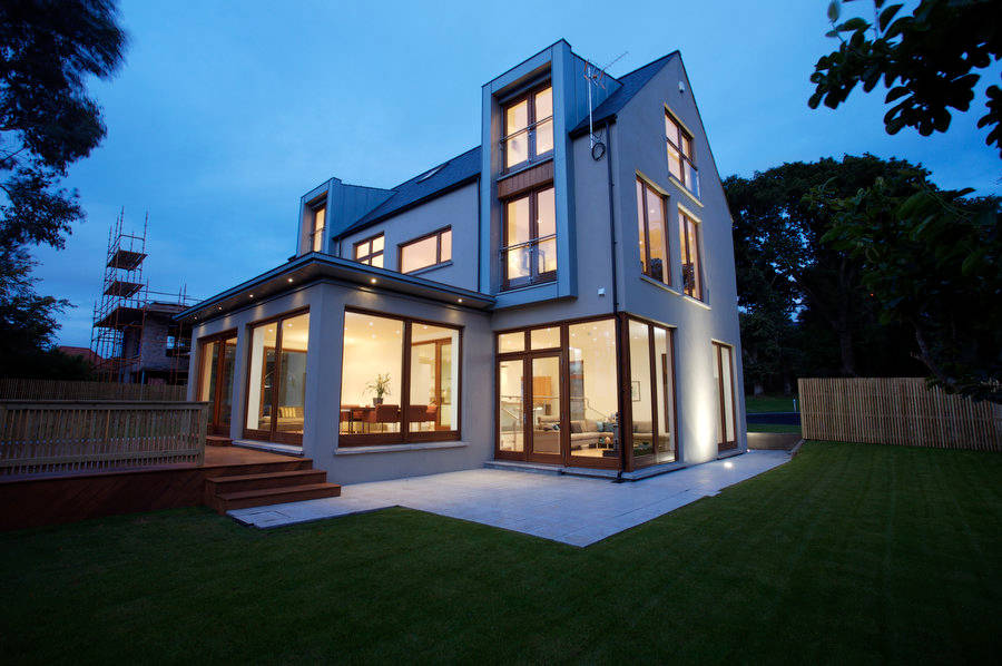 A collection of four contemporary iroko timber-clad modern family homes ...