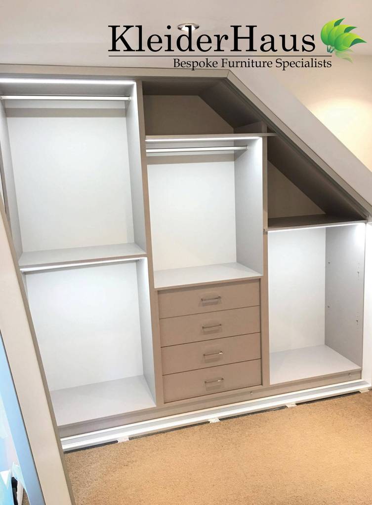 Fitted sloping ceiling sliding door wardrobe | homify