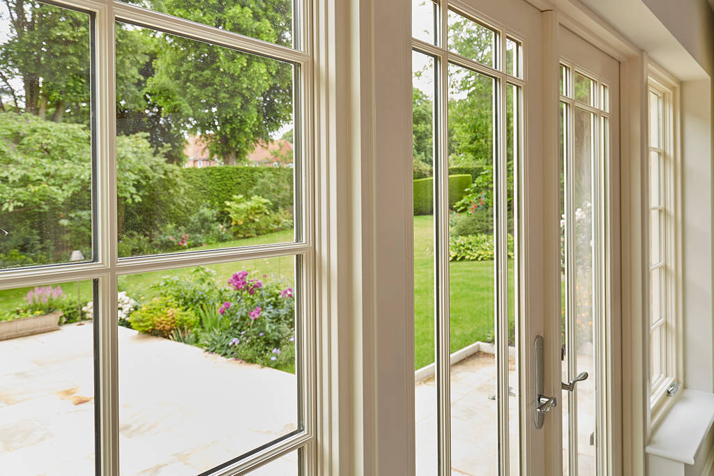 Aluclad wood casement windows with french vanilla finish | homify