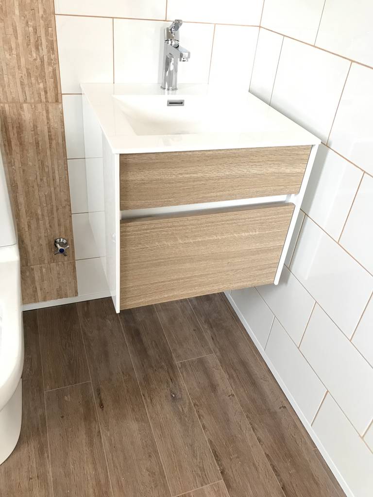 Mueble vanitorio baño de visitas. vivienda premium 115m2 fundo loreto. | homify