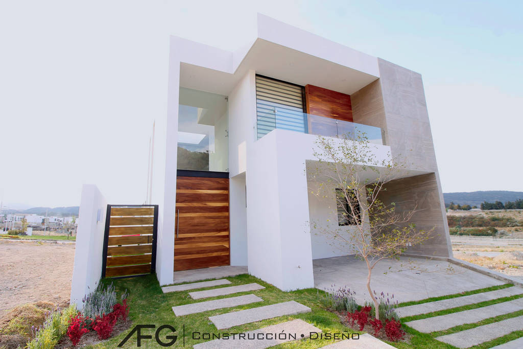 Fachada: casas unifamiliares de estilo por afg construcción y diseño ...