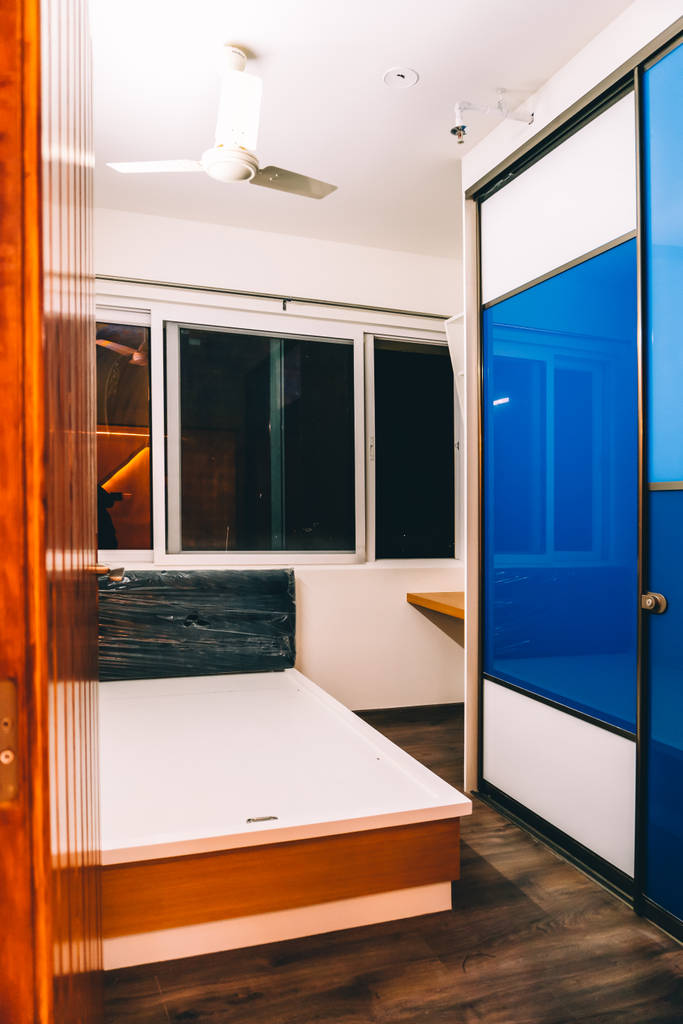 Kids bedroom's acrylic sliding wardrobes and false ceiling—origami ...