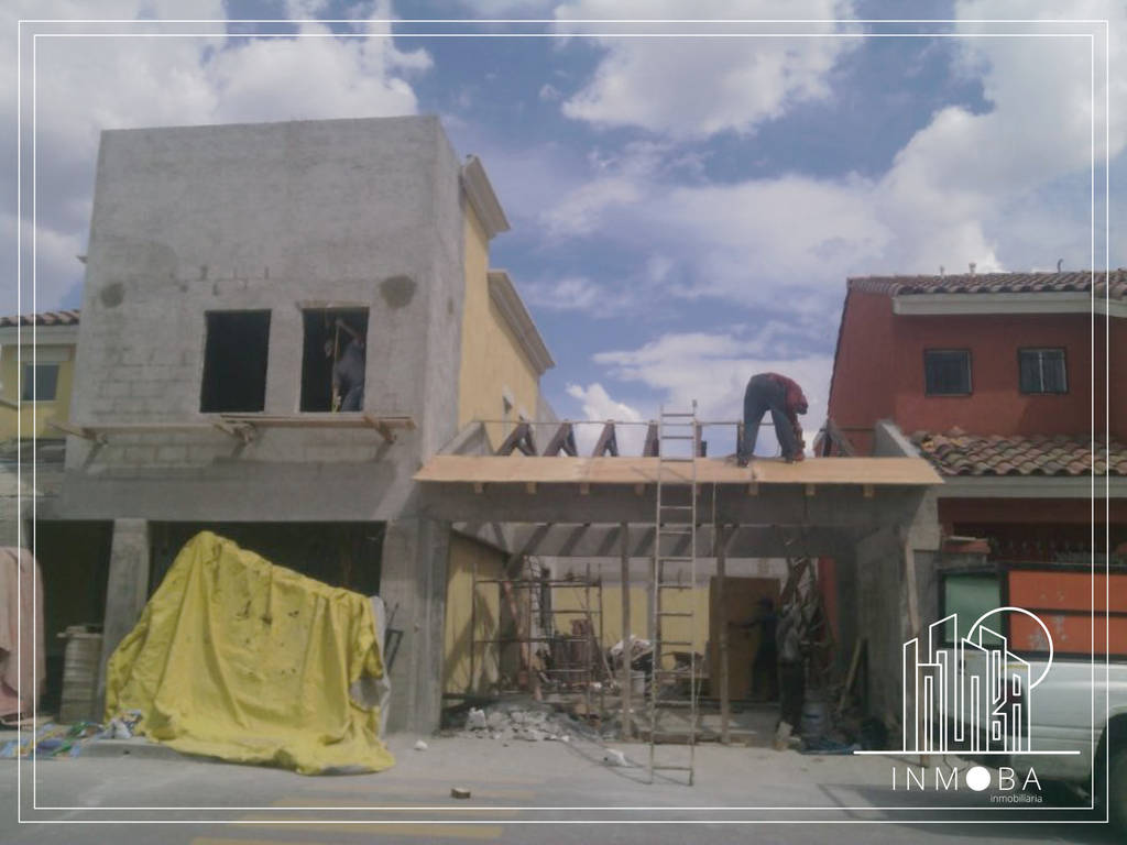 Colocación de teja, pegado de piedra de cantera e fachada principal ...