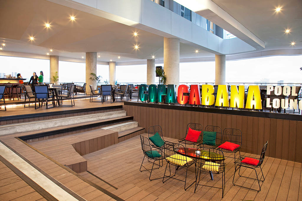 Interior – void in pool & cafe area phl architects hotel modern | homify