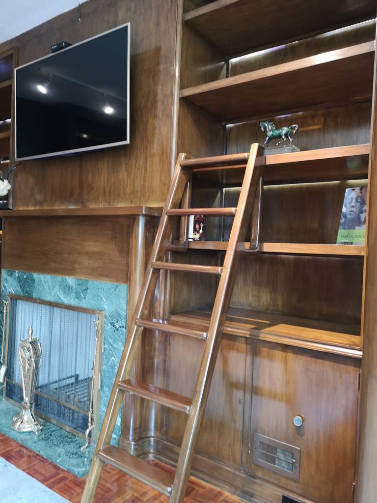 Librero con escalera corrediza para oficina principal | homify