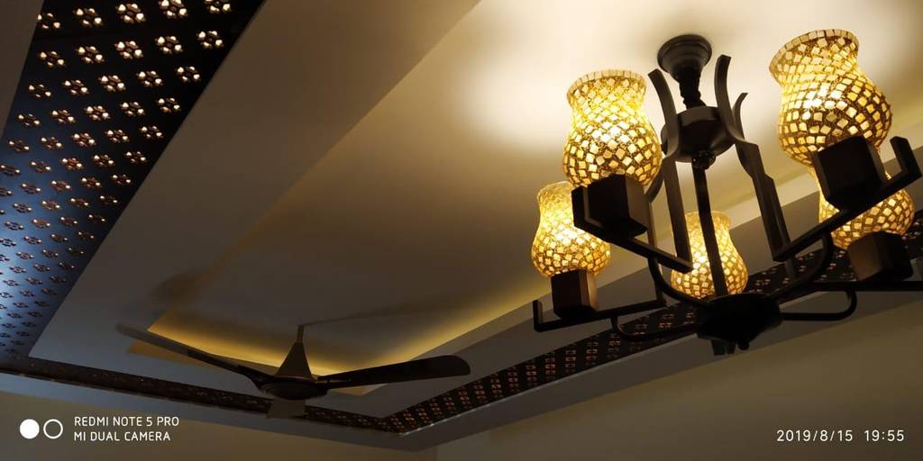 False ceiling design with pop and mdf laser cut | homify