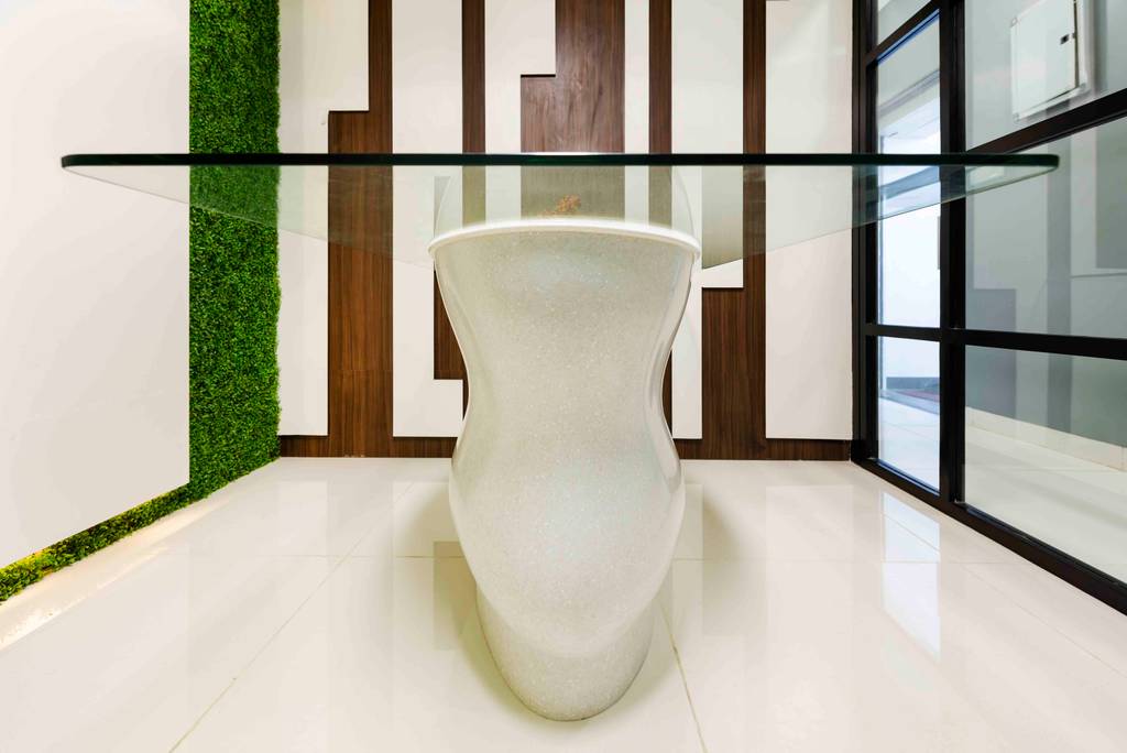 Curve moulded corain cantilever table | homify