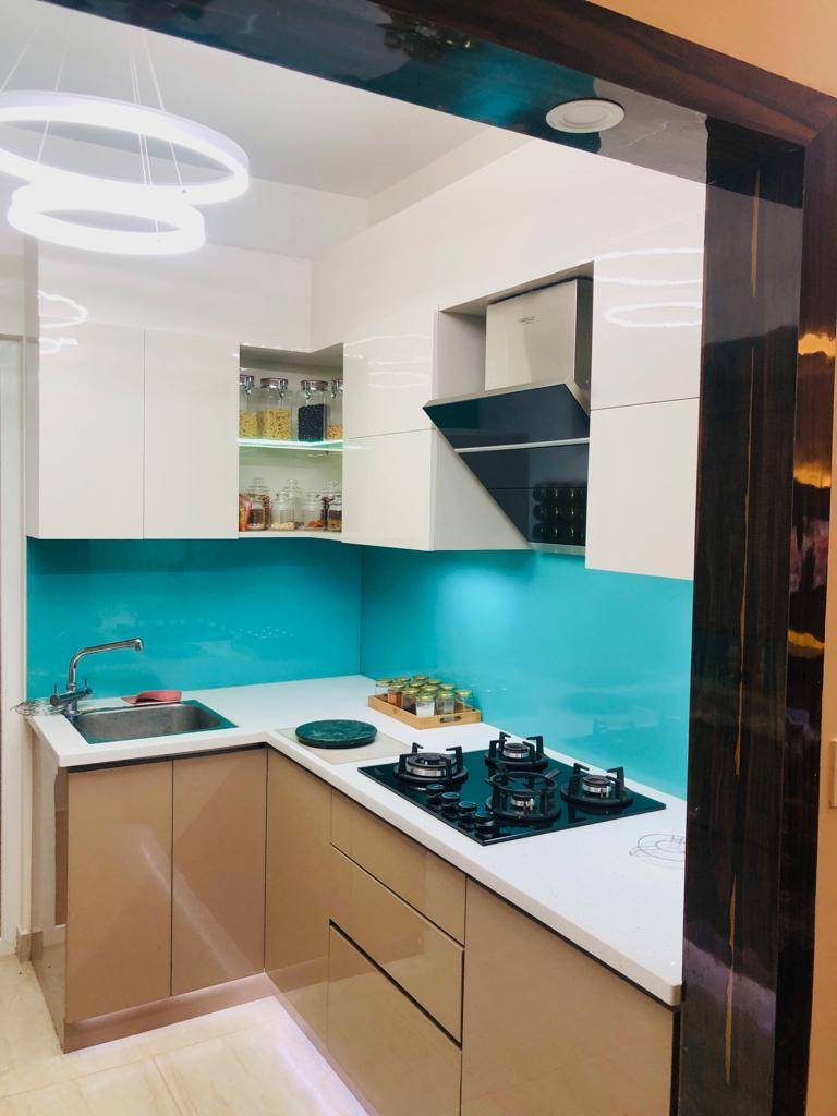 Handle-less kitchen done with acrylic sheets with glass back-splash 12 ...