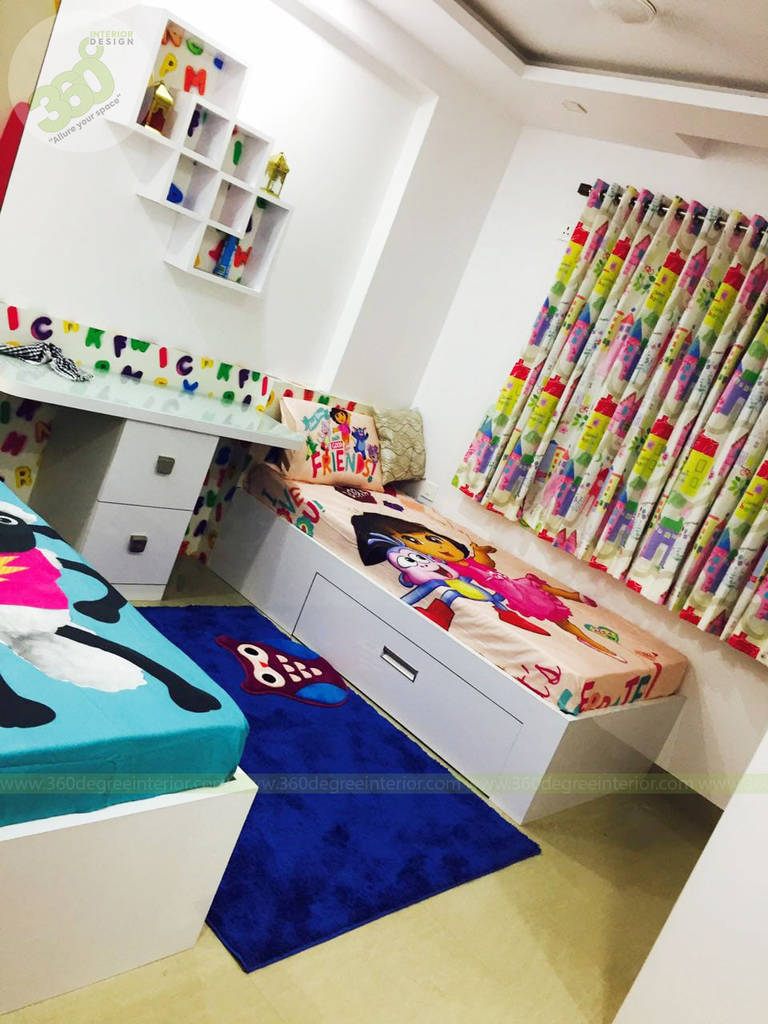 Kids bedroom—wardrobe, cot for kids & study table | homify