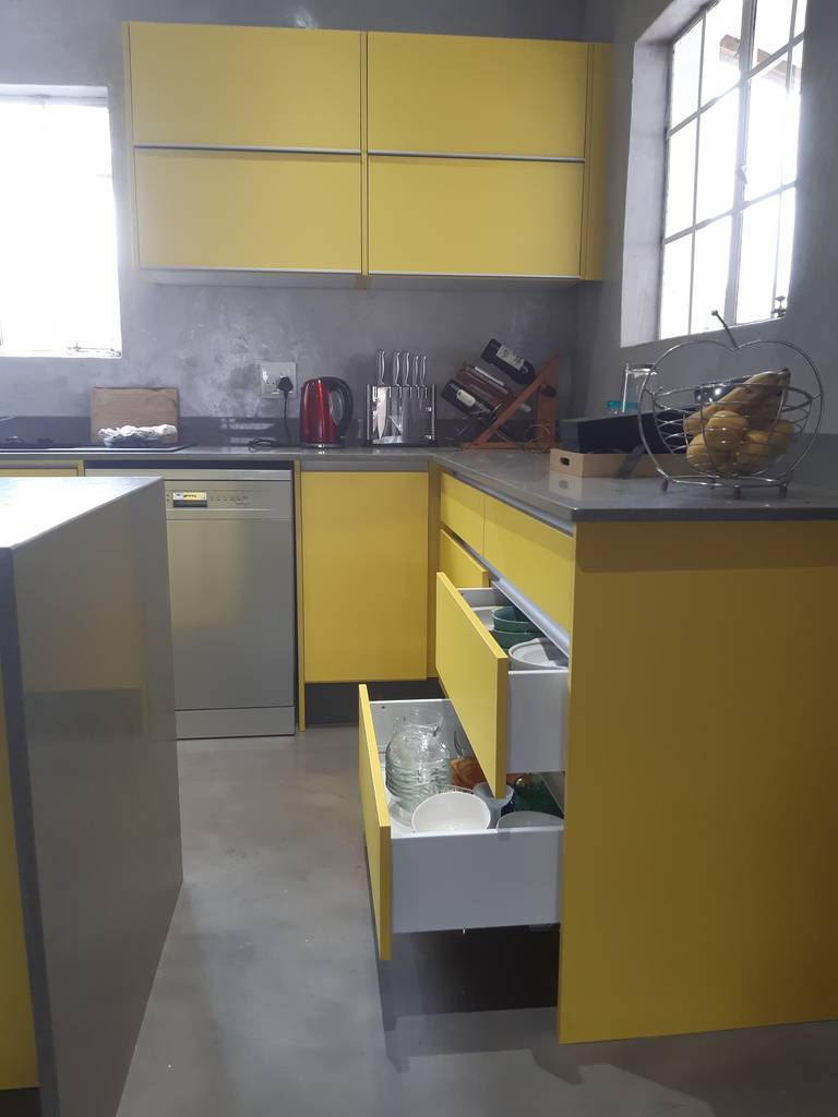 Modern yellow kitchen with gola handle system, stylish kitchens | homify