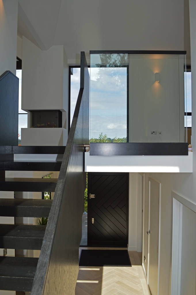 Bespoke staircase leading to new first floor accommodation for a ...