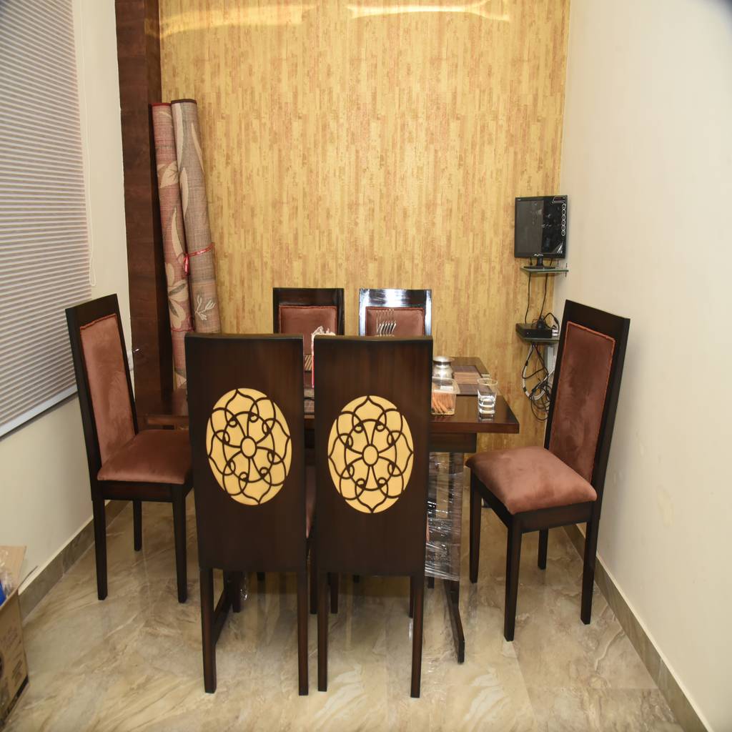 Actual photo of 6 seater wooden dining table with chairs in dining room ...