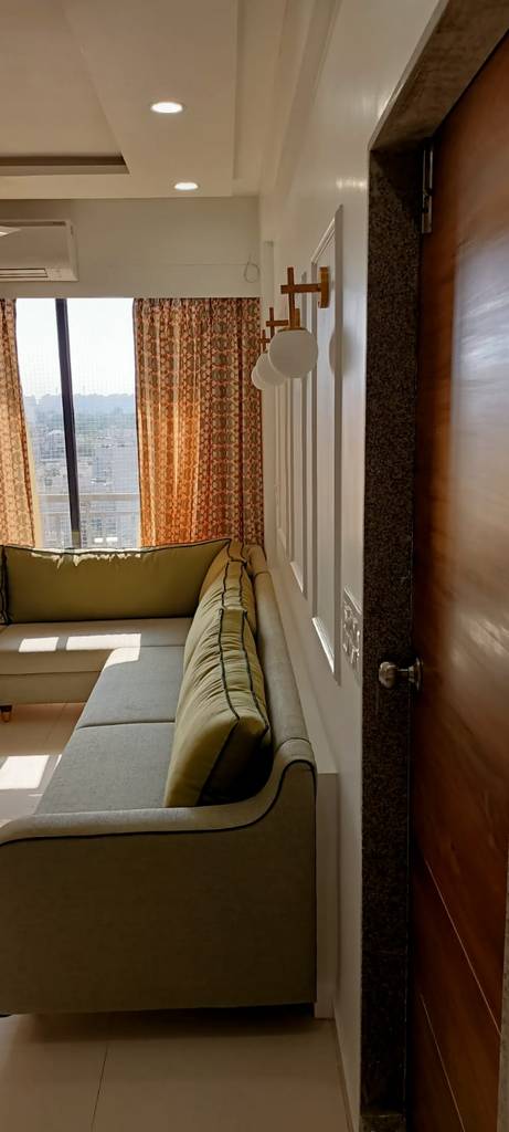 Classic and elegant living room with beautiful wall lights and very ...